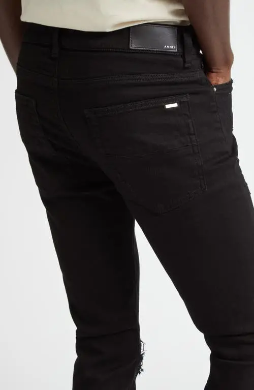 Amiri Mx1 Leather Patch Ripped Skinny Jeans - Black Od | Editorialist